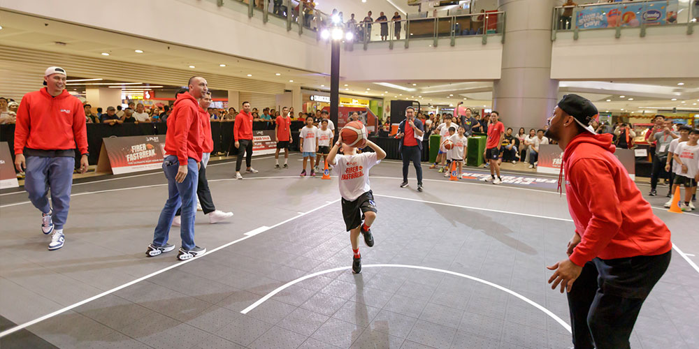 One big assist: Basketball champs train future MVPs in PLDT Home Fiber ...